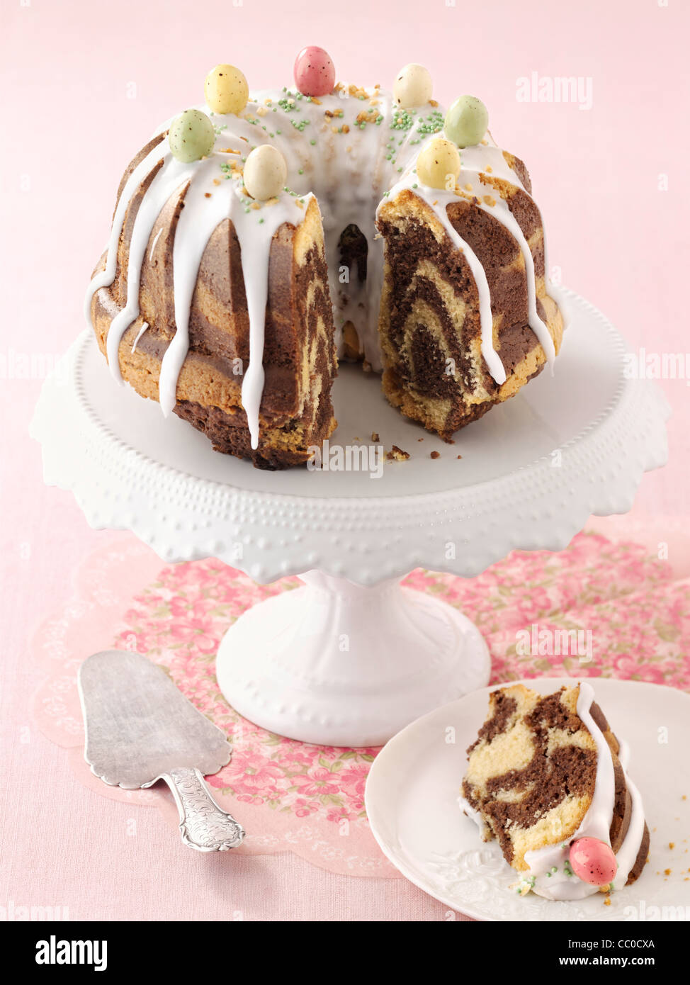 Almond ring cake with egg nog, cut Stock Photo - Alamy