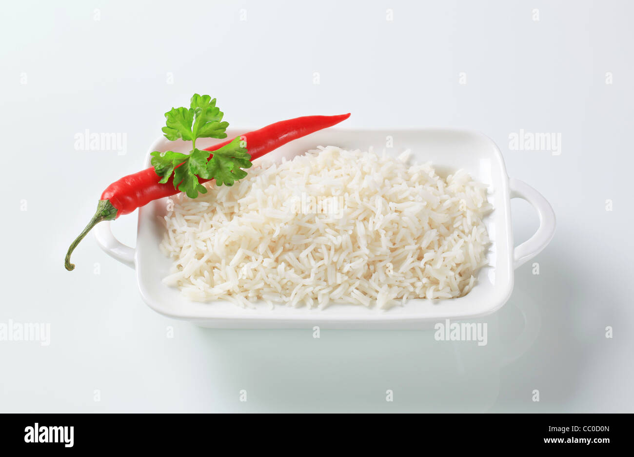 Boiled white rice in a porcelain dish Stock Photo - Alamy