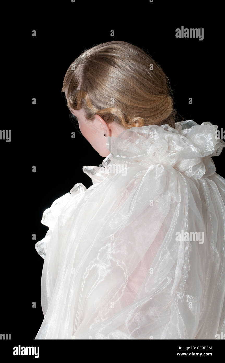 Rear view of a blond woman in silky dress Stock Photo - Alamy