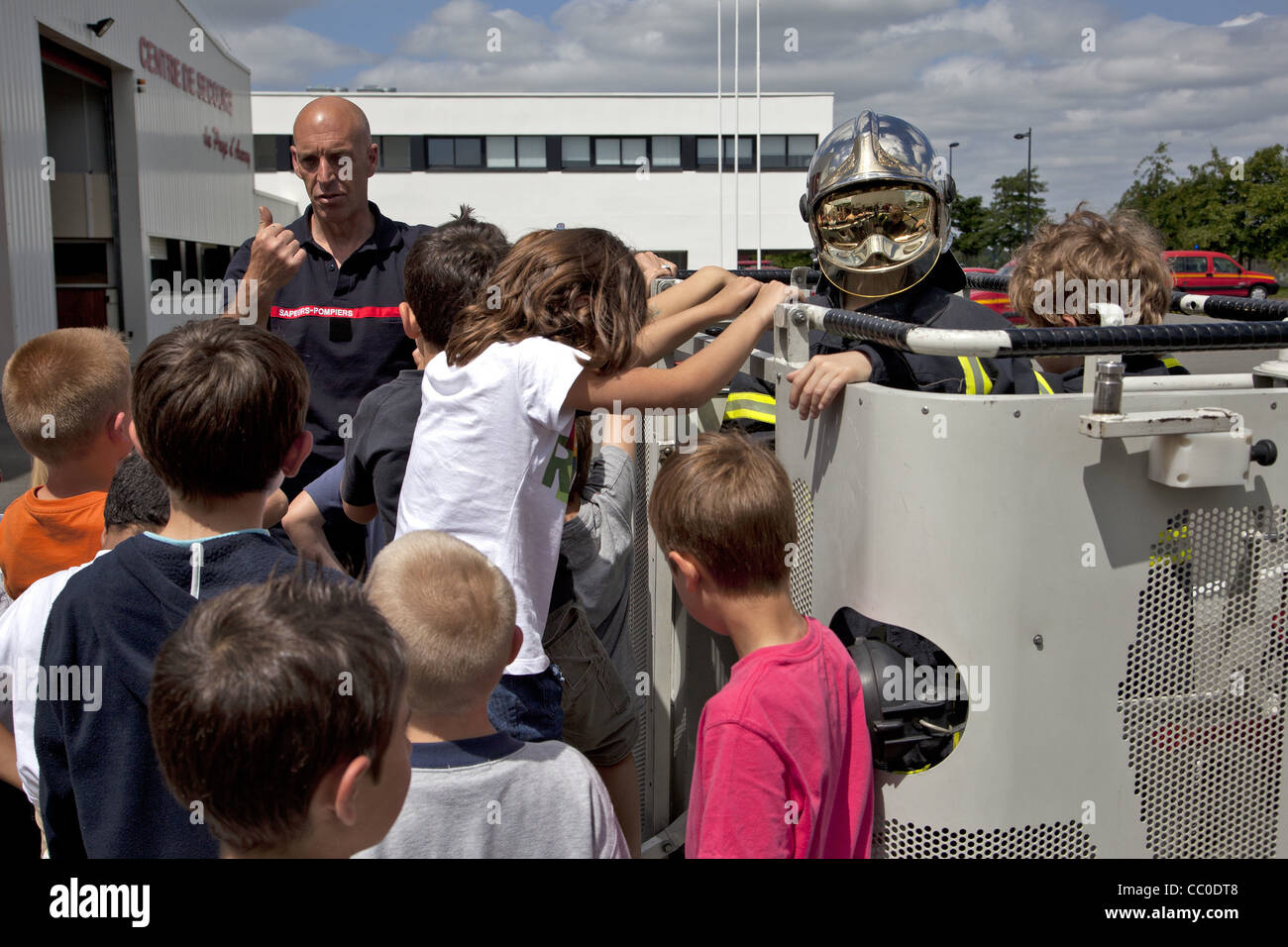SCHOOL TRIP OF PRIMARY SCHOOLCHILDREN AT A FIREHOUSE, FIRE DEPARTMENT ...