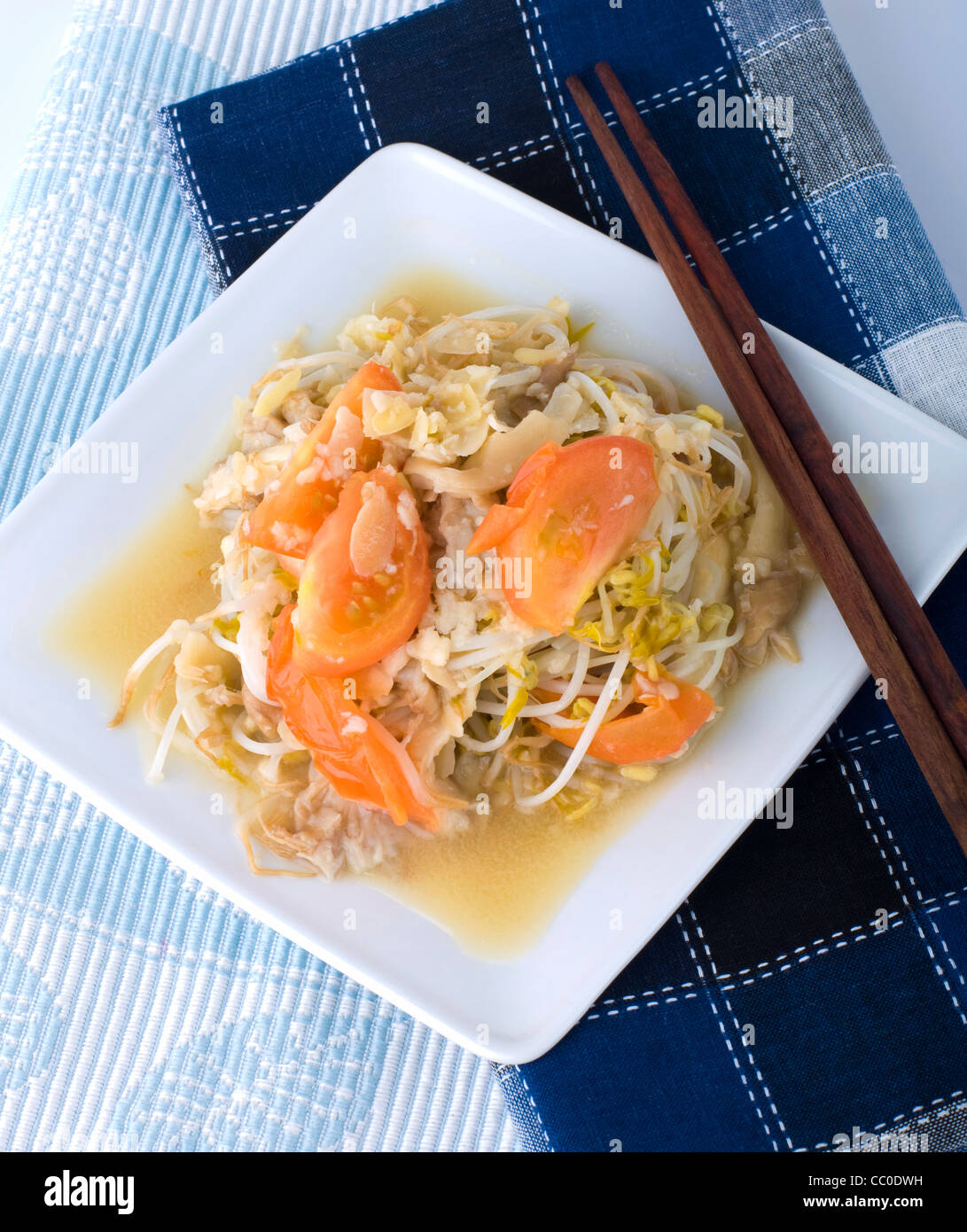 Cooked organic bean sprouts with tomatoes & mushroom Stock Photo - Alamy
