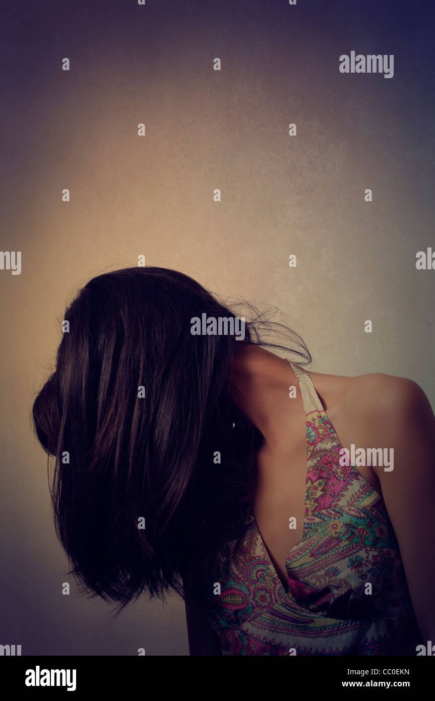 Young woman hair covering face Stock Photo - Alamy