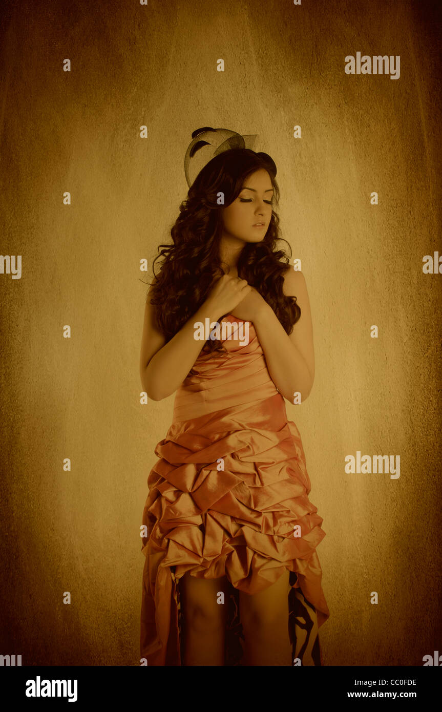 Young woman hands over heart Stock Photo - Alamy