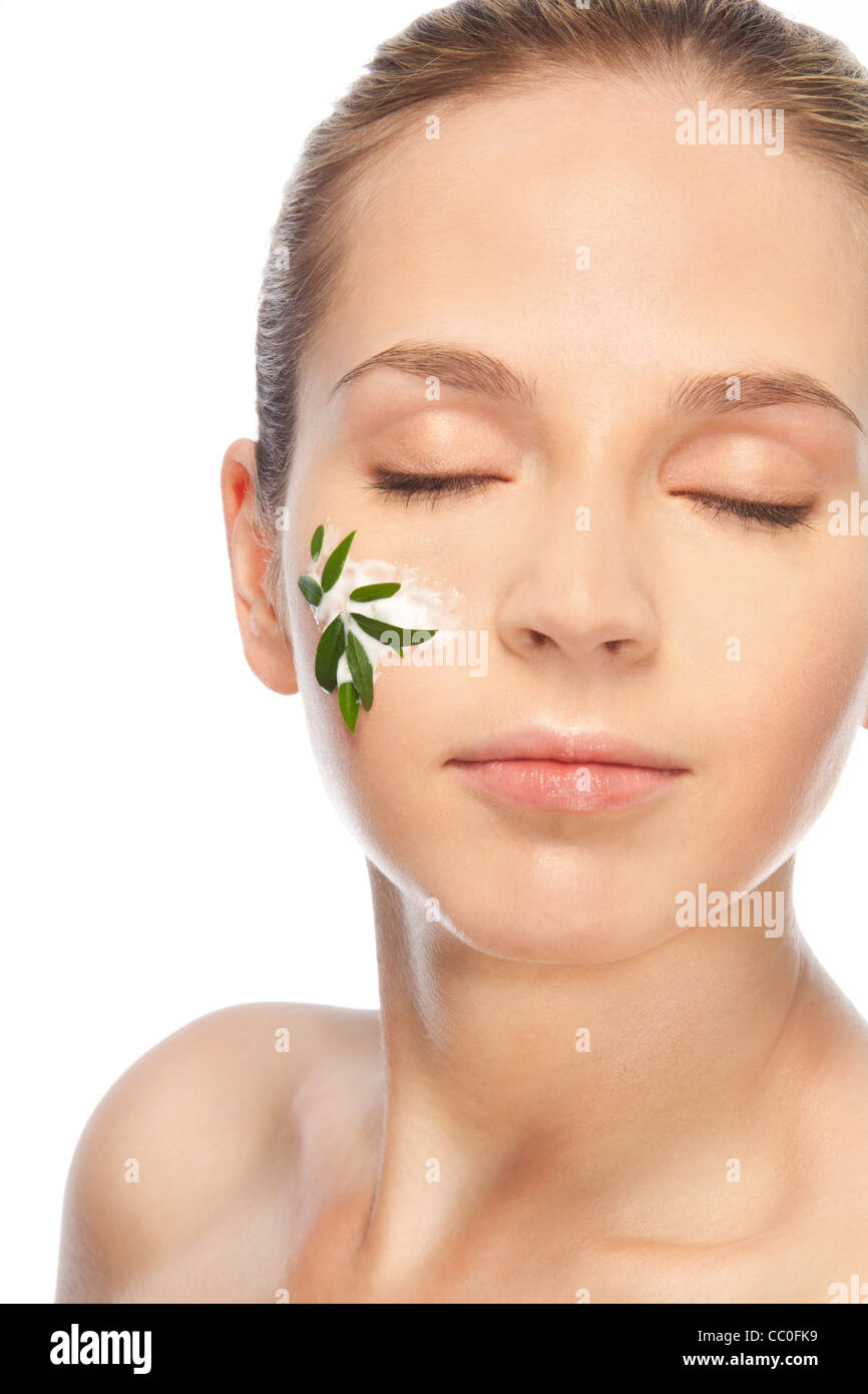 Portrait of young woman with healthy natural cosmetics on her face ...