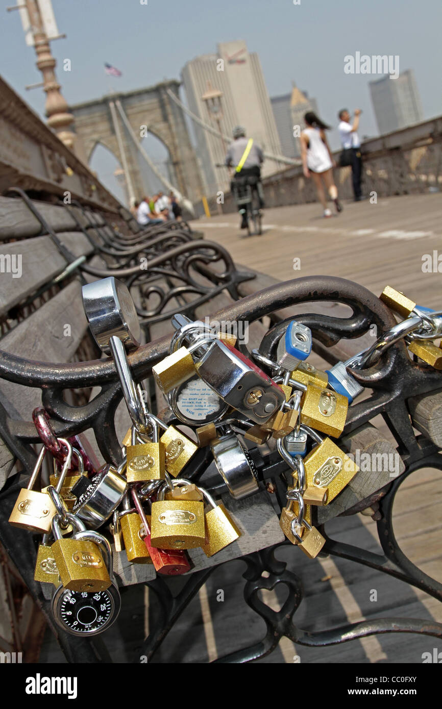 PADLOCKS, SYMBOL OF ETERNAL LOVE, ATTACHED TO A BENCH ON THE BROOKLYN ...