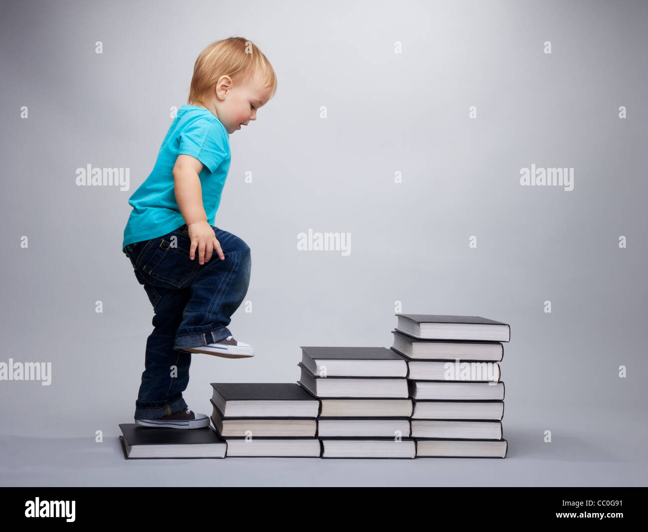 Toddler climbing steps hi-res stock photography and images - Alamy