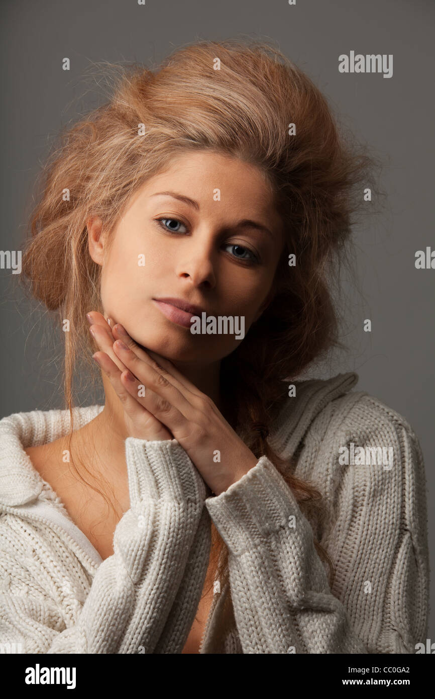 Portrait of a calm beautiful woman with professional make up and hair ...