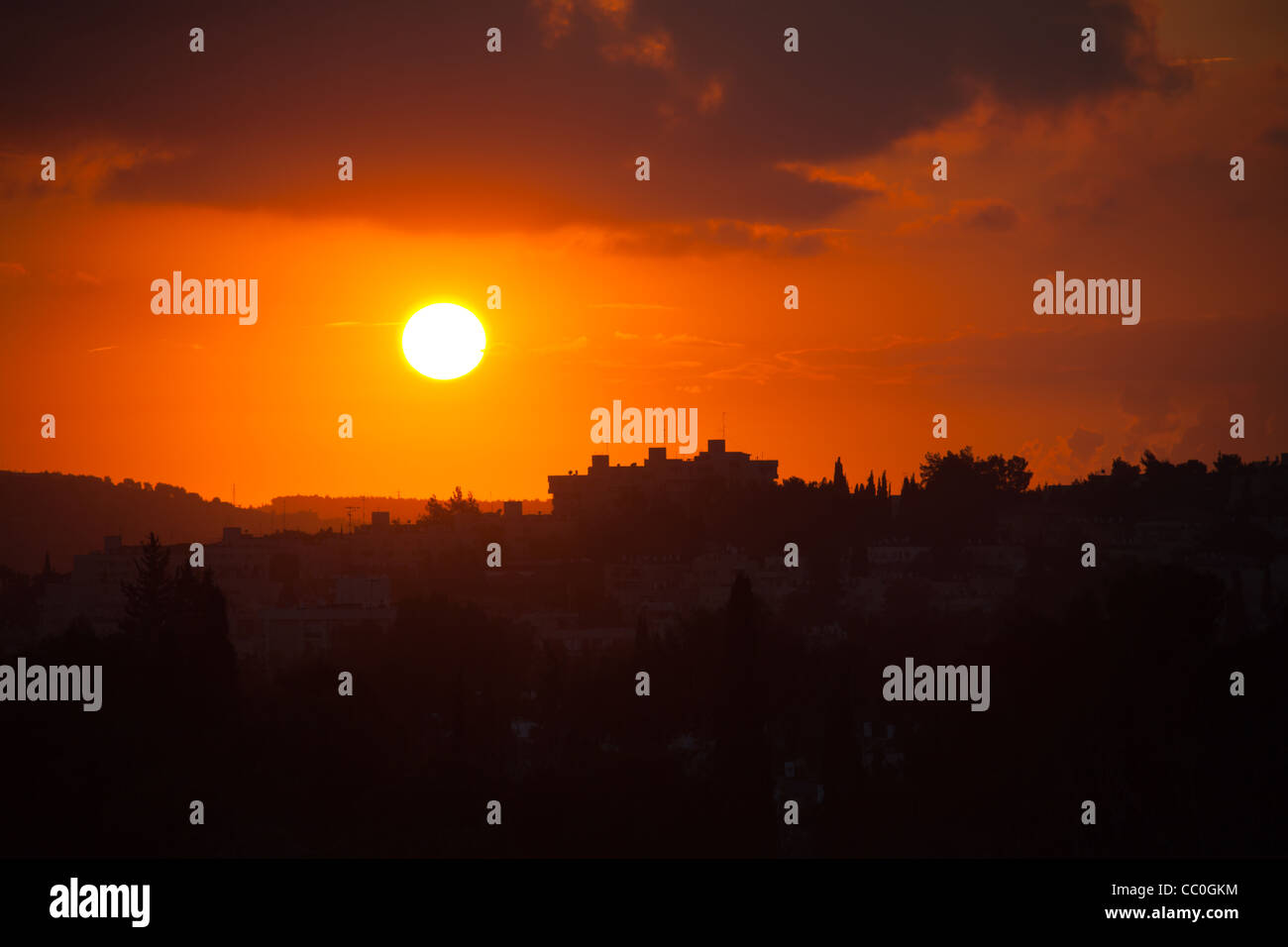 Beautiful sunset with a red sun in Jerusalem evening Stock Photo - Alamy