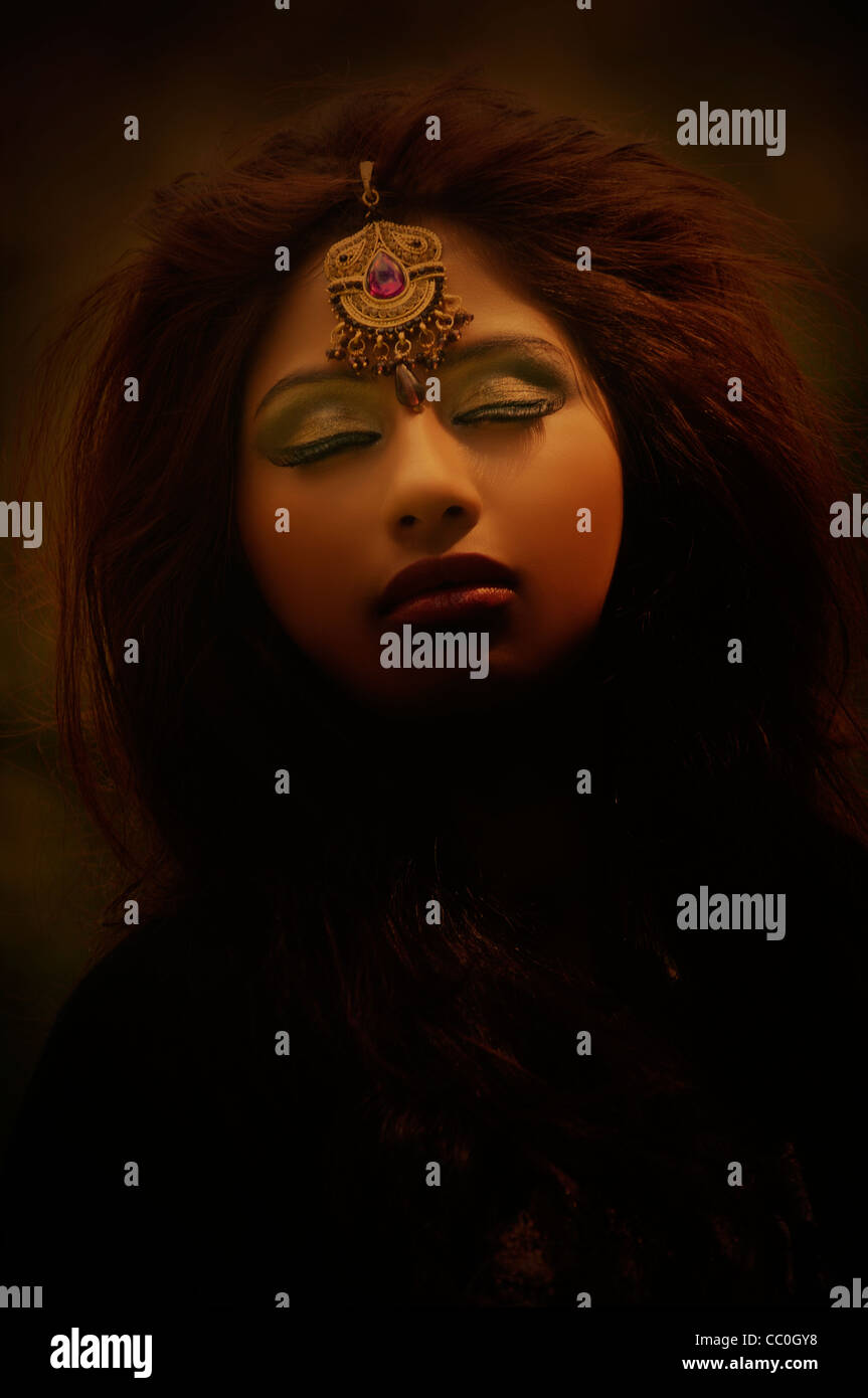 Beautiful young Asian woman eyes closed Stock Photo - Alamy