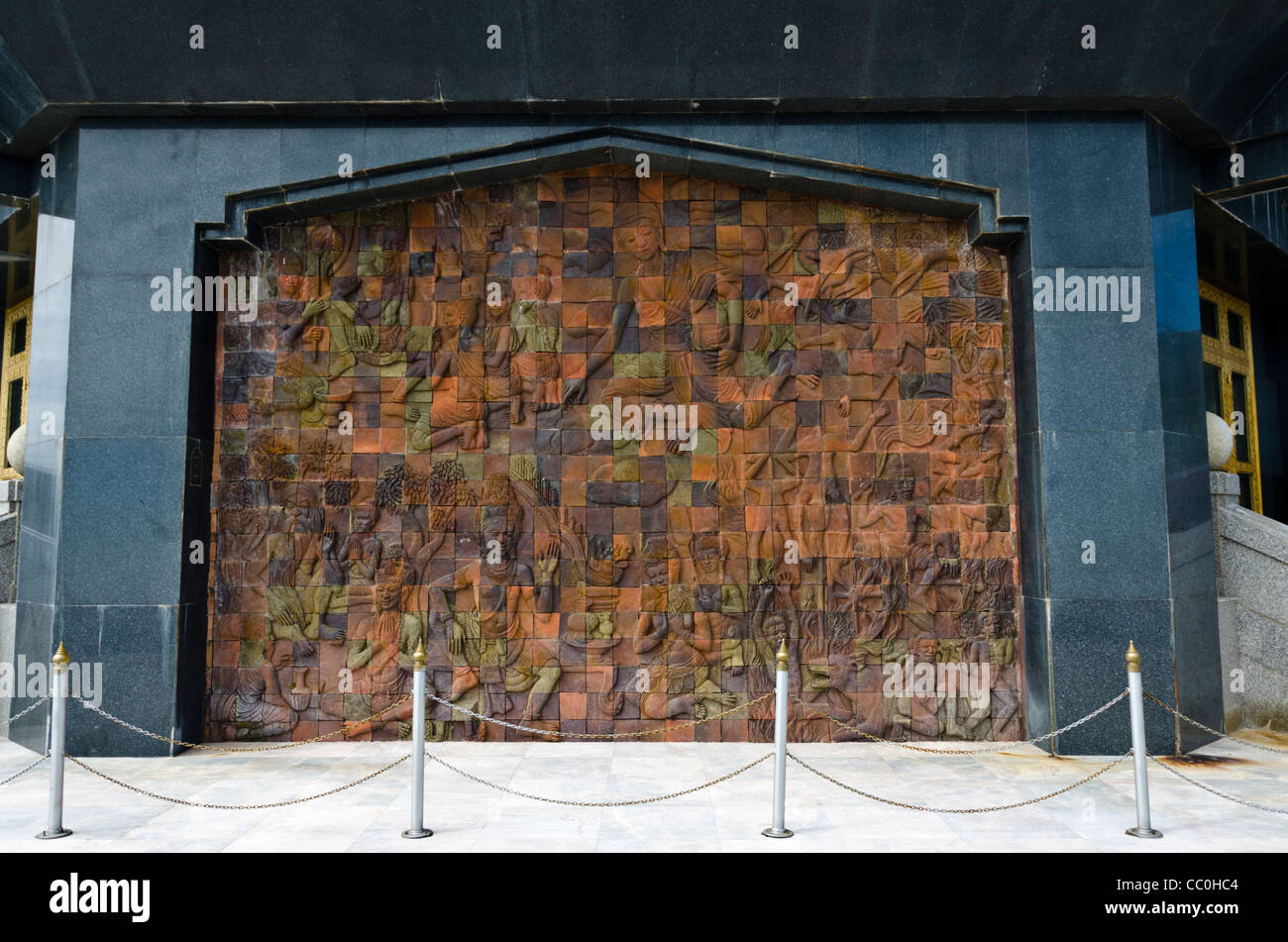 Carved stone Buddhist mural at base of King's Pagoda at Doi Inthanon ...