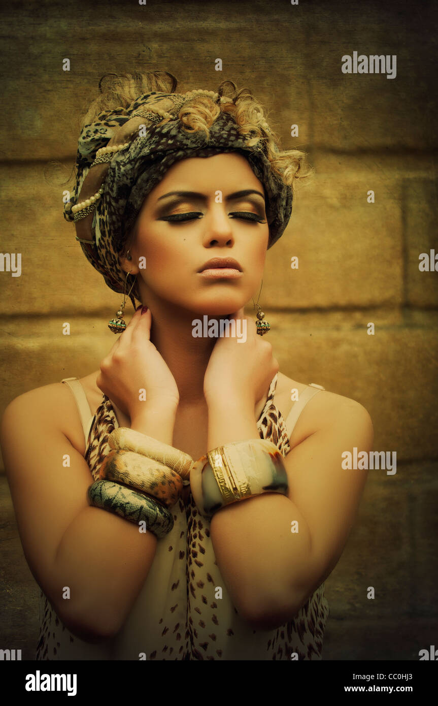 Young woman hands touching neck Stock Photo - Alamy