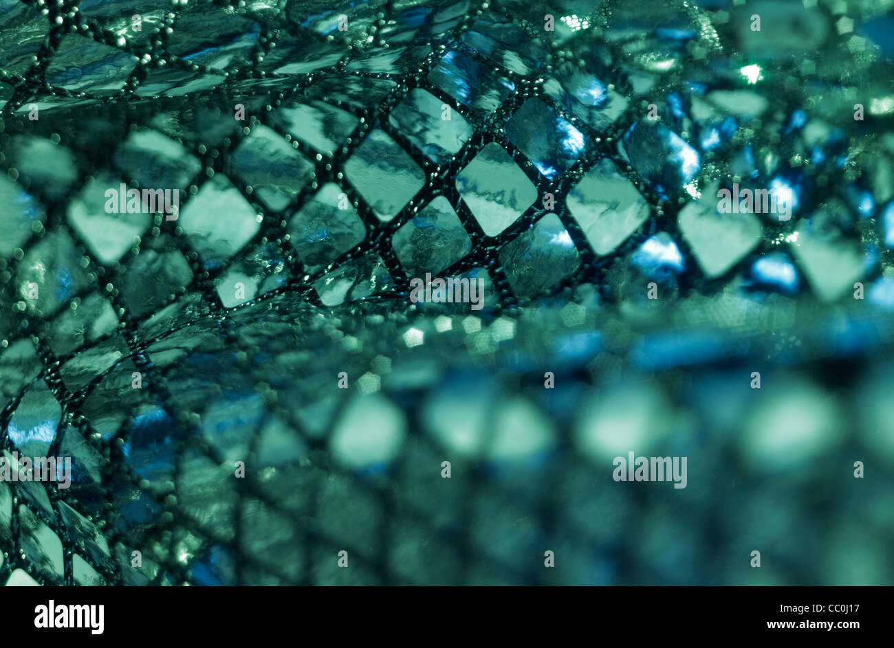 abstract blue and green reflective background with selective focus ...