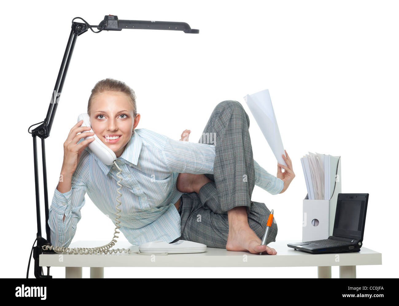 Woman on her phone in an office Cut Out Stock Images & Pictures - Alamy