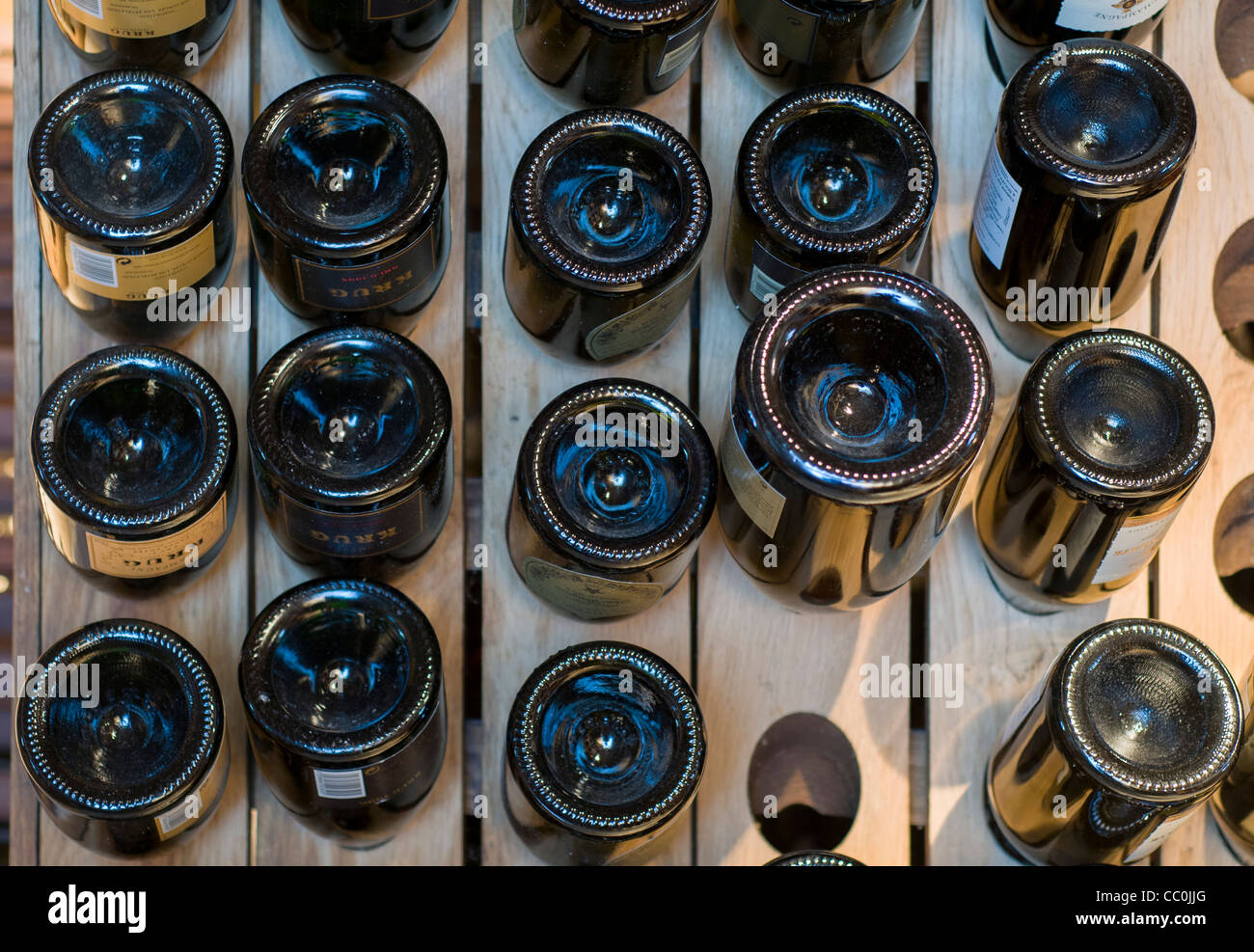 Sparkling Wine and Champagne Bottles Stored in Riddling Rack at Italian ...
