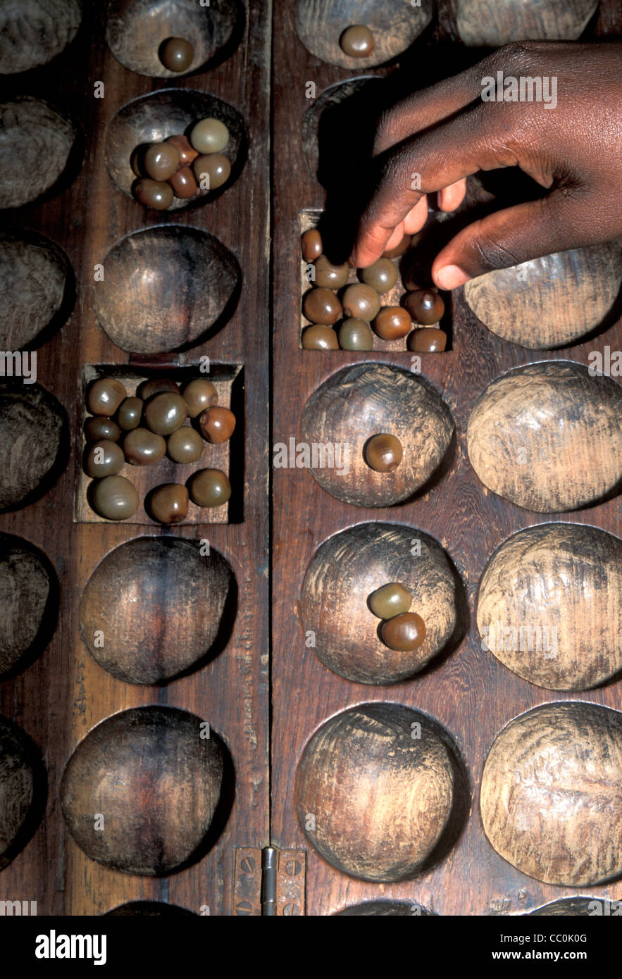 Bao is a board (mancala) game played especially on the Swahili coast of ...