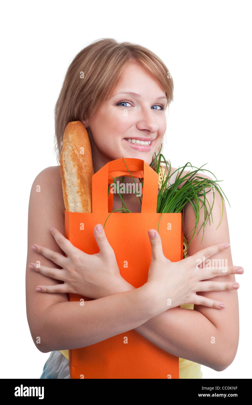 Pretty girl hugging a bag with baguette Stock Photo - Alamy