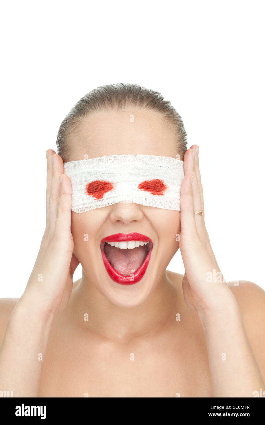 Blind woman screaming holding her head with hands Stock Photo - Alamy