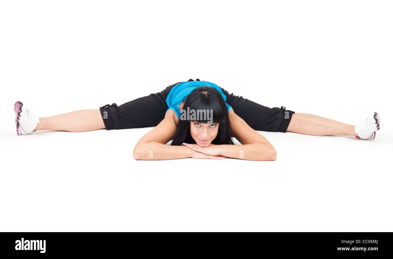 positive woman show splits exercise on the floor Stock Photo - Alamy