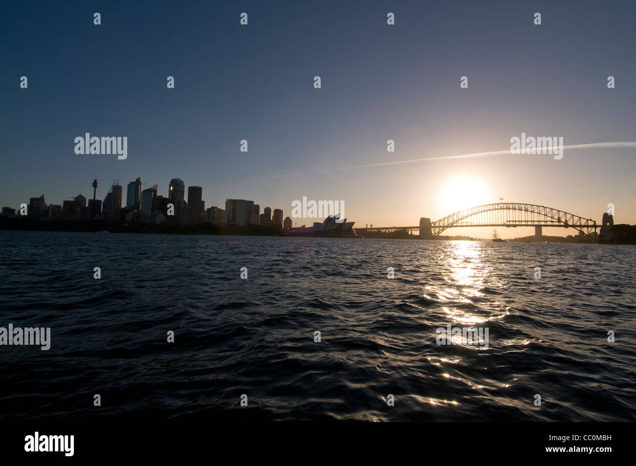 Sunset over Harbour Bridge and the Opera House on Sydney harbour in ...