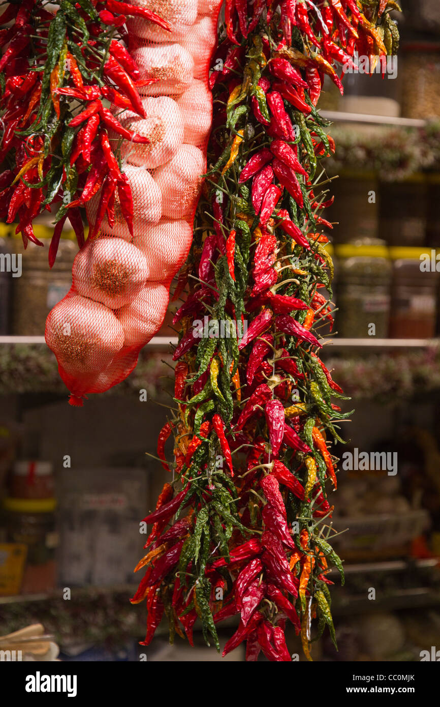 String of garlics and red chilies hanged displayed for sale in La ...