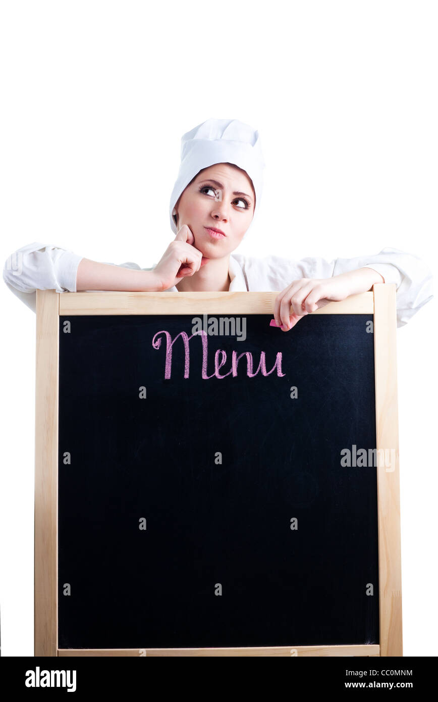 Chef thinking about menu to write on blackboard Stock Photo - Alamy
