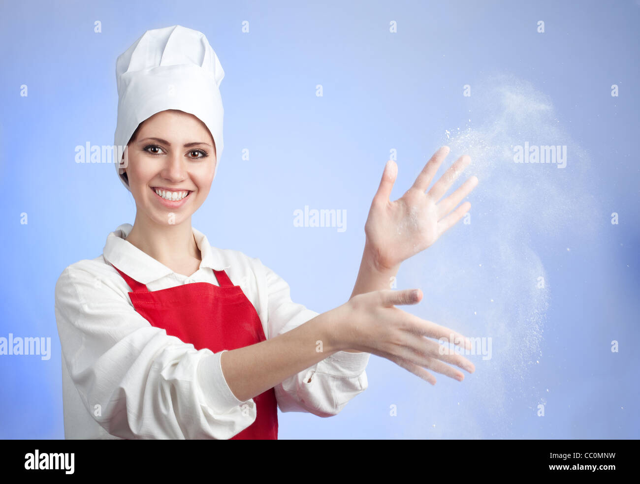Happy smiling chef shake off flour from hands Stock Photo - Alamy