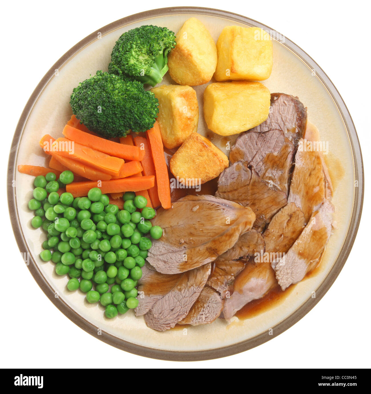 Traditional Sunday roast lamb dinner Stock Photo - Alamy