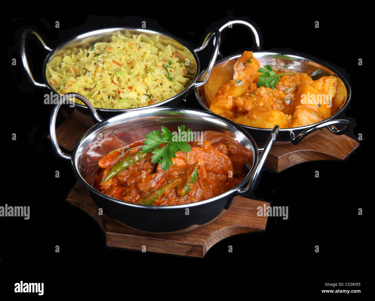 Indian Chicken Jalfrezi with Bombay Aloo and Pilau Rice Stock Photo - Alamy