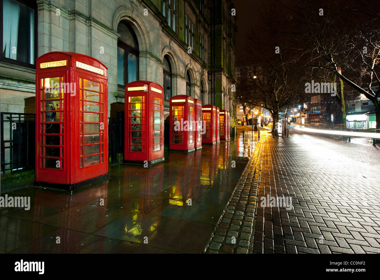Row of Red Telephone Boxes Stock Photo - Alamy