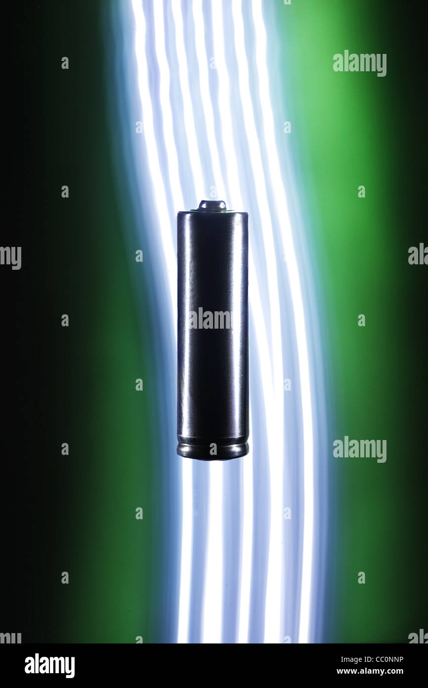 battery with blue lightning isolated on green background Stock Photo ...