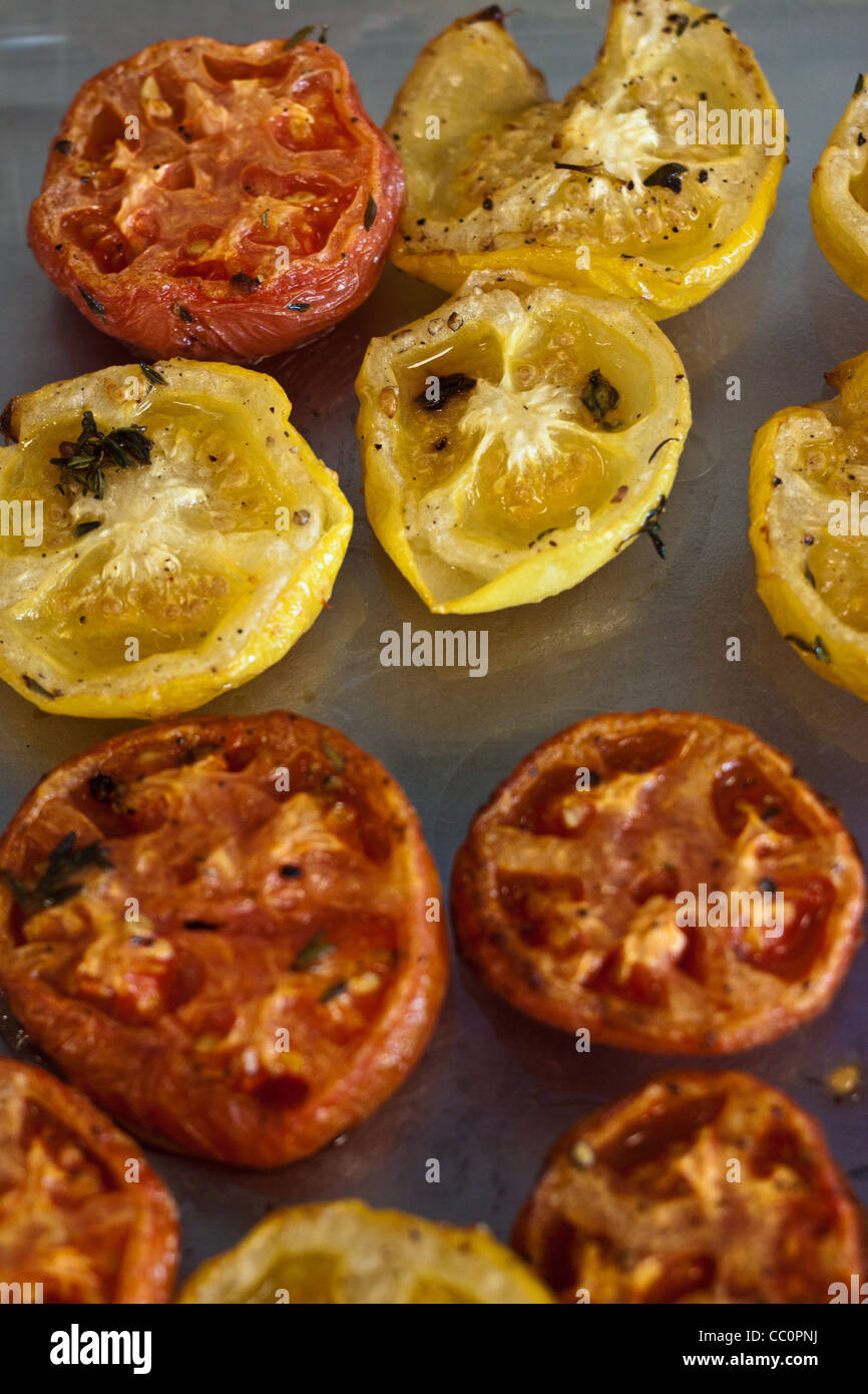 Roasted organic red and yellow tomatoes Stock Photo - Alamy