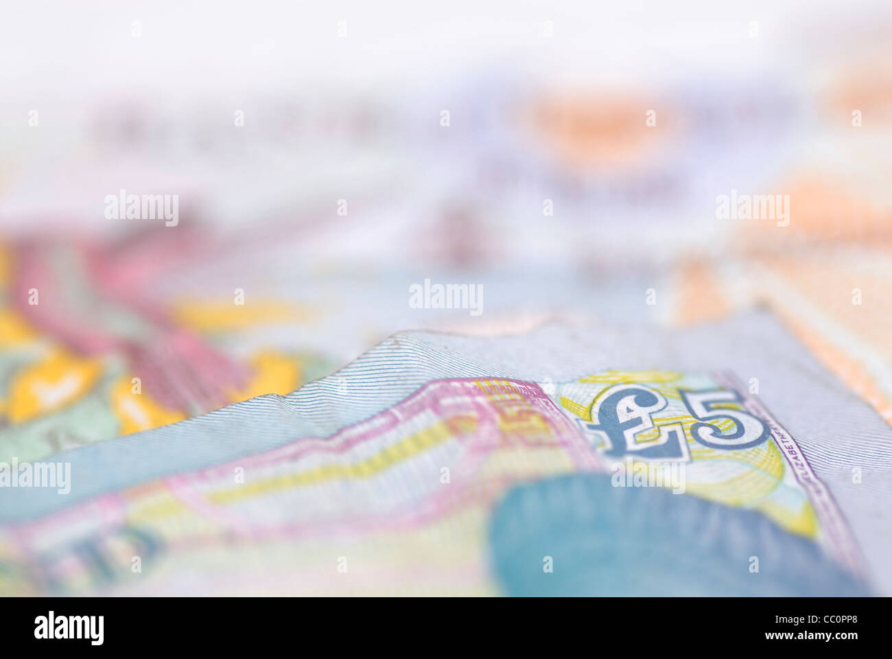 Macro image of English bank notes. Focus on £5 note Stock Photo - Alamy