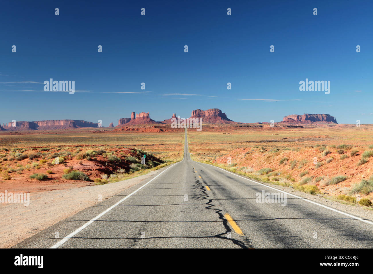 Monument Valley from US Route 163 Utah showing Milepost 13 Stock Photo ...