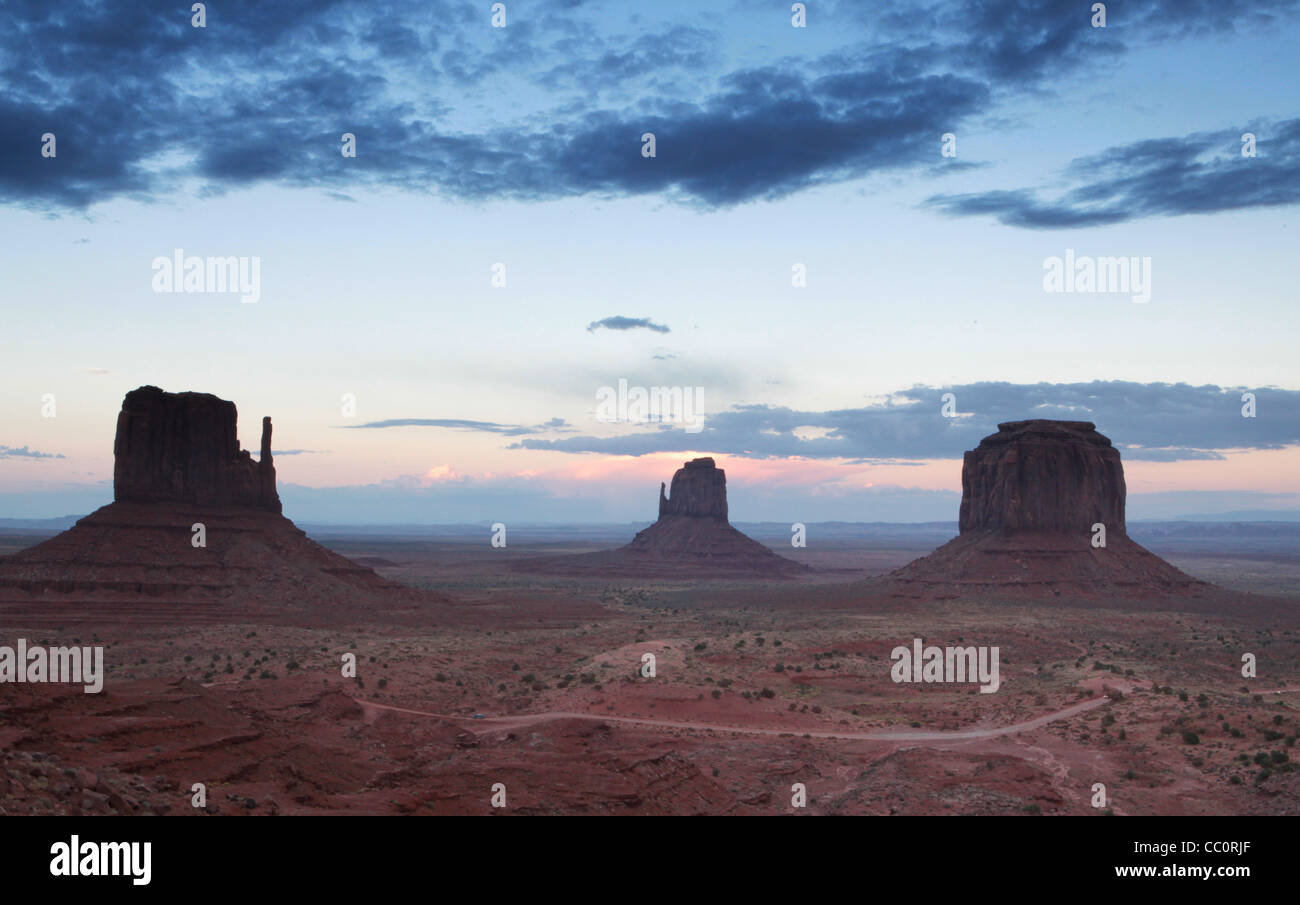 East and West Mitten and Merrick Butte at dawn in Monument Valley ...