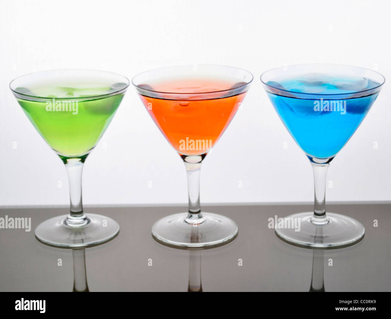 fruit cold drinks assortment with reflection Stock Photo - Alamy