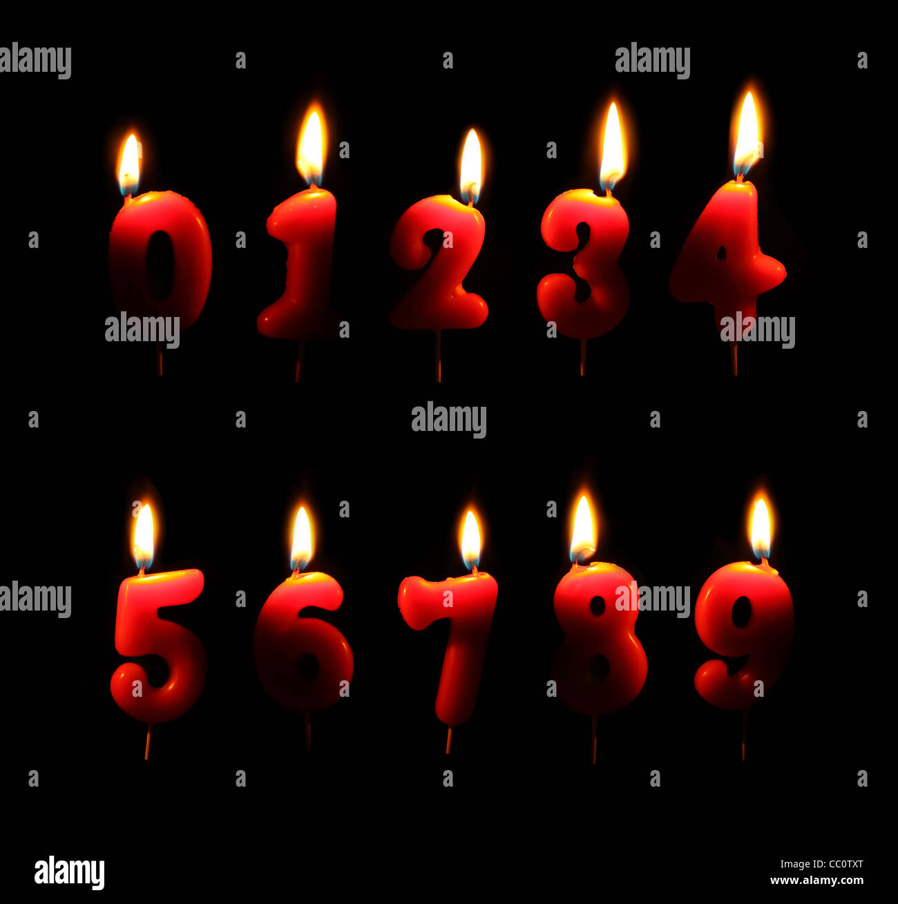 Burning number candles in dark Stock Photo - Alamy