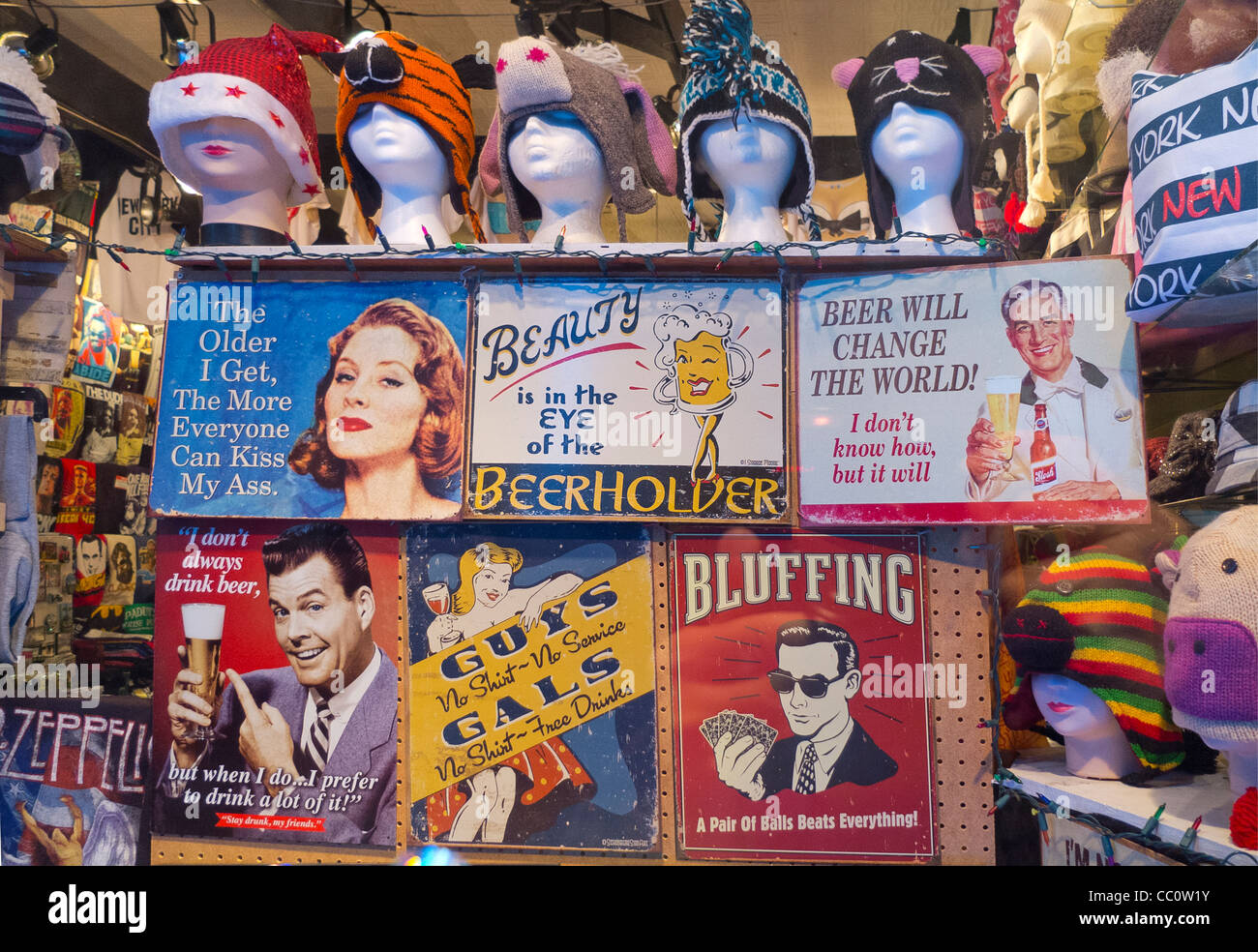 old fashioned signs and winter hats for sale in a store in Greenwich ...