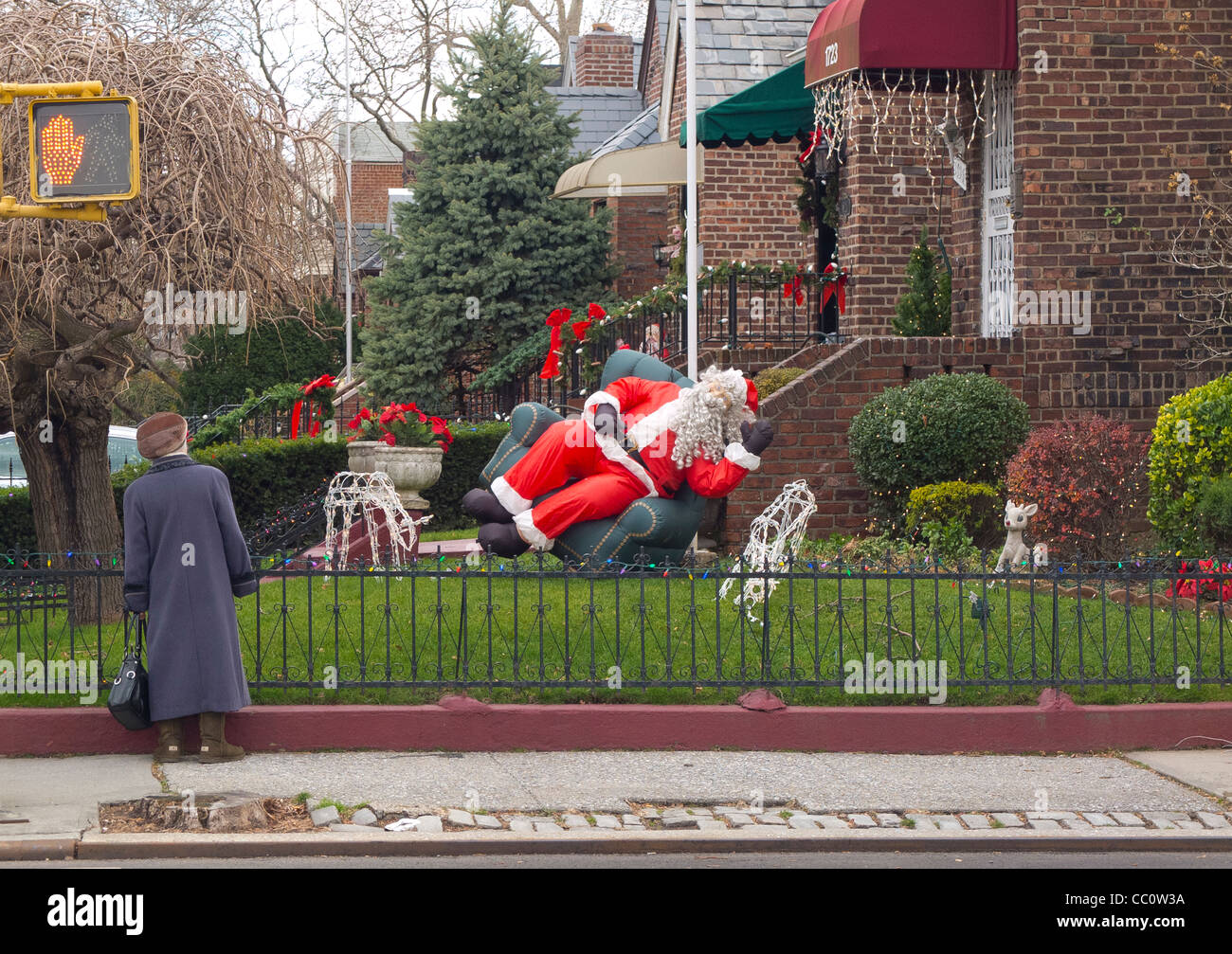 blow up santa leaning over Stock Photo - Alamy