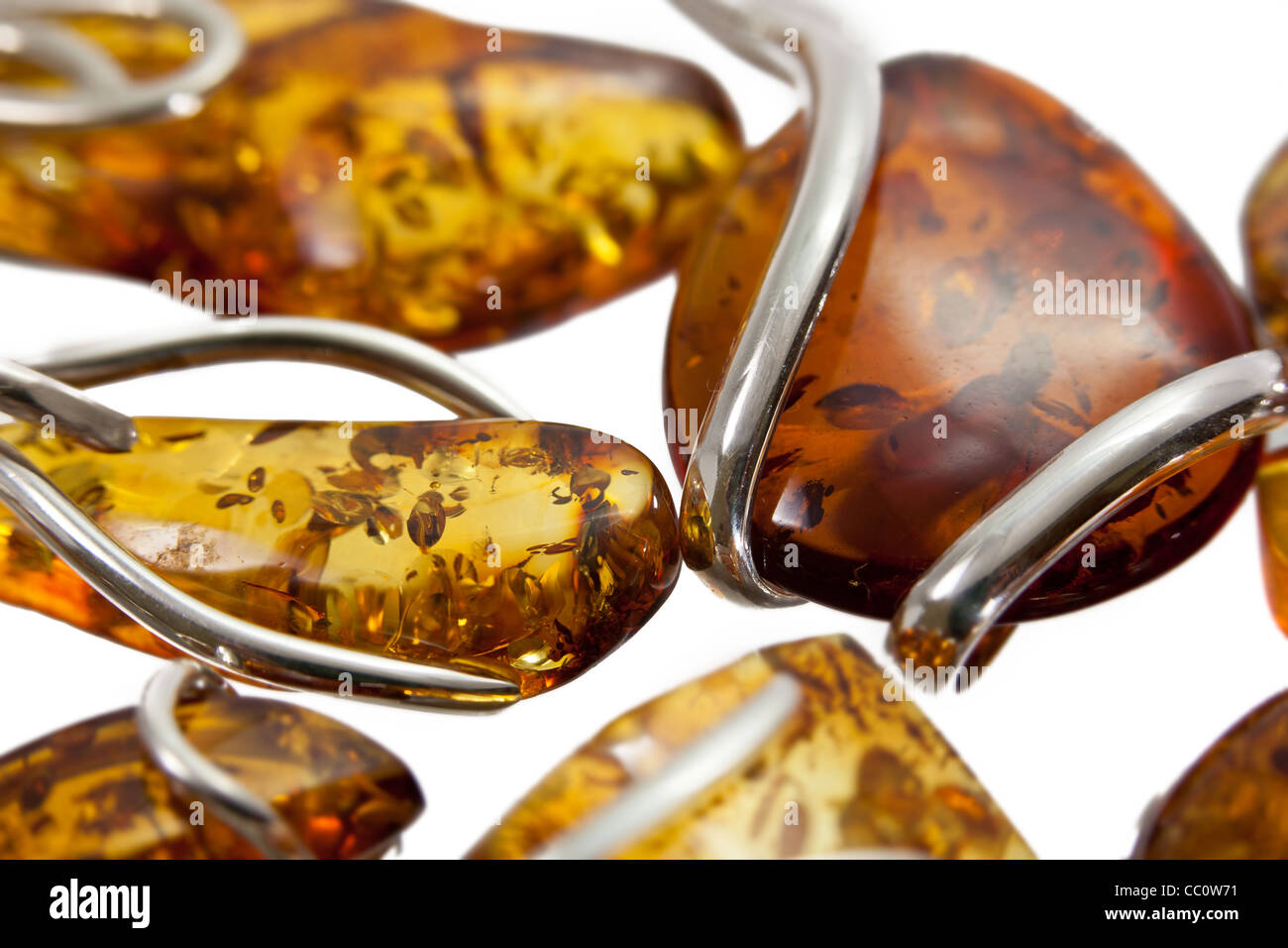 Amber Jewellery jewelery in groups and close ups, against white ...