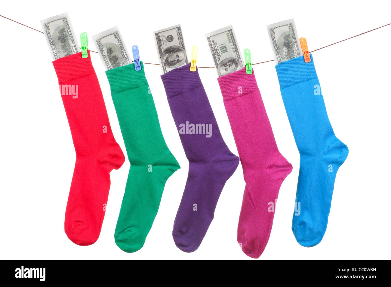 five colorful socks money hang on clothesline grafted with clothes peg ...