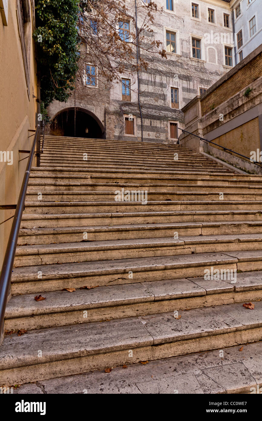 A steep marble staircase leading to an old building in Rome, Italy ...
