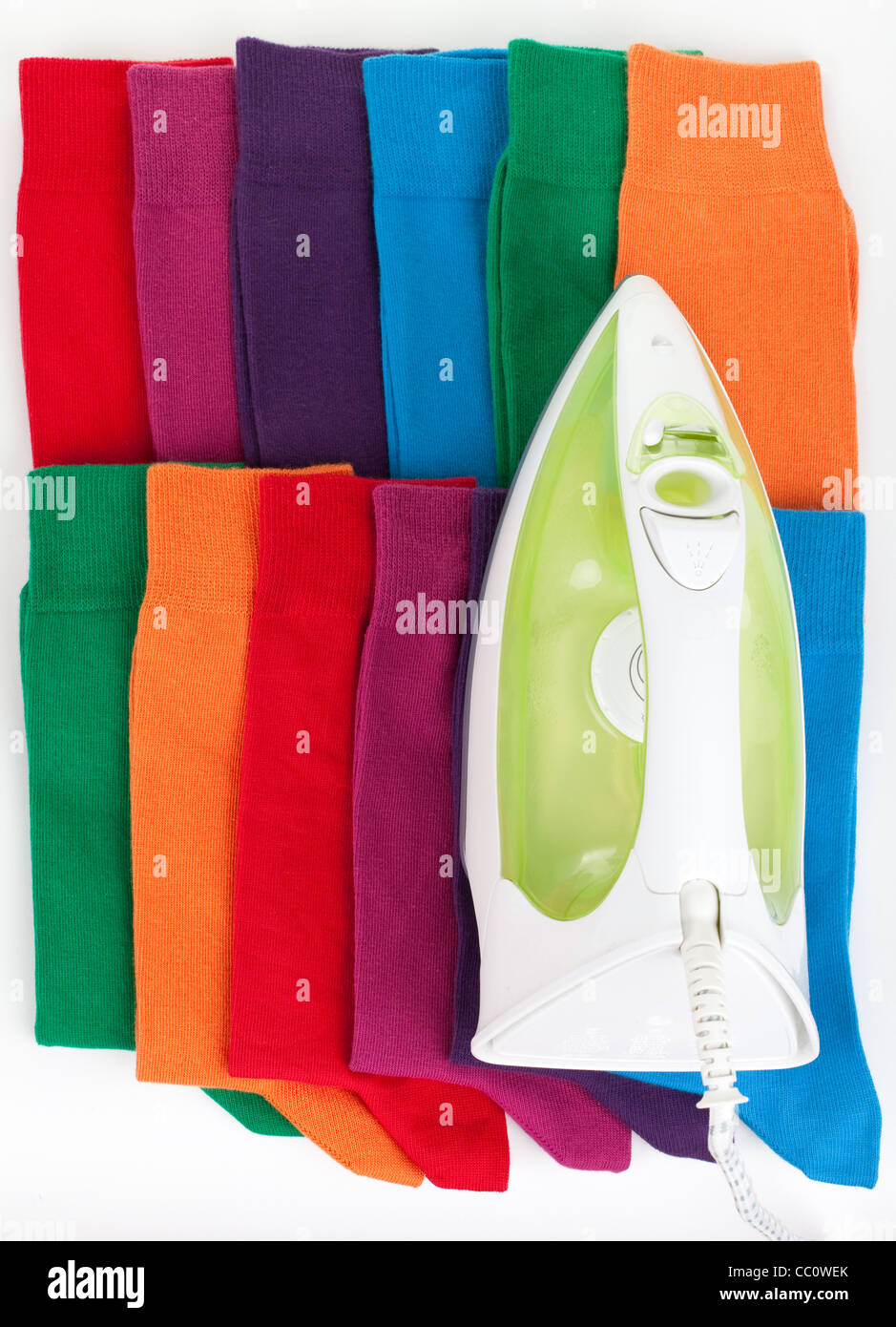 Iron and different color brand new socks Stock Photo - Alamy