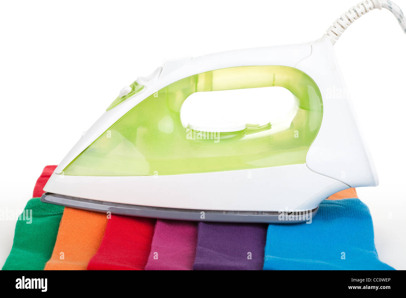 Iron on different color socks clothes isolated on white Stock Photo - Alamy