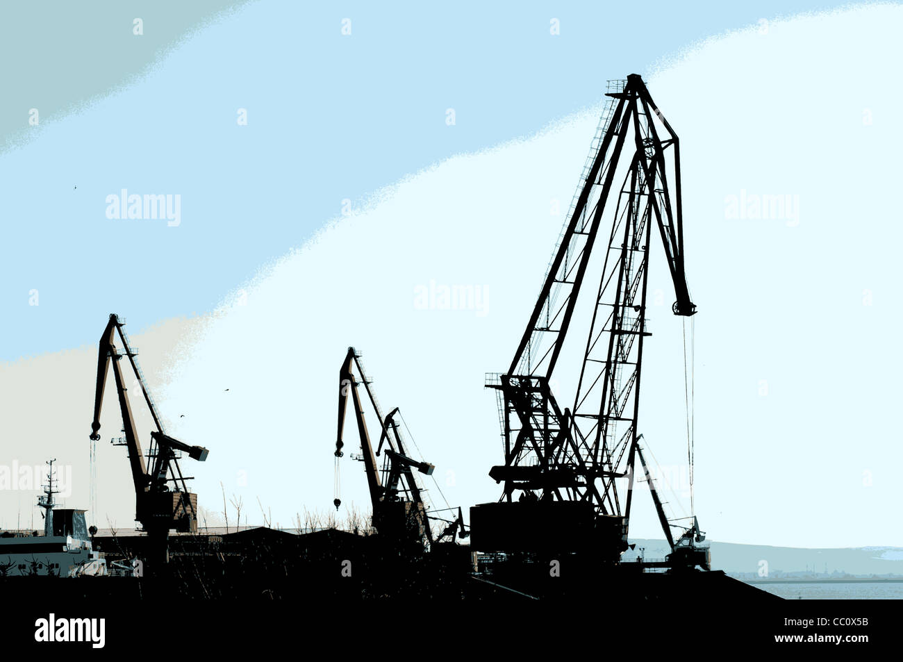 Commercial port cranes. Cranes in a port Stock Photo - Alamy
