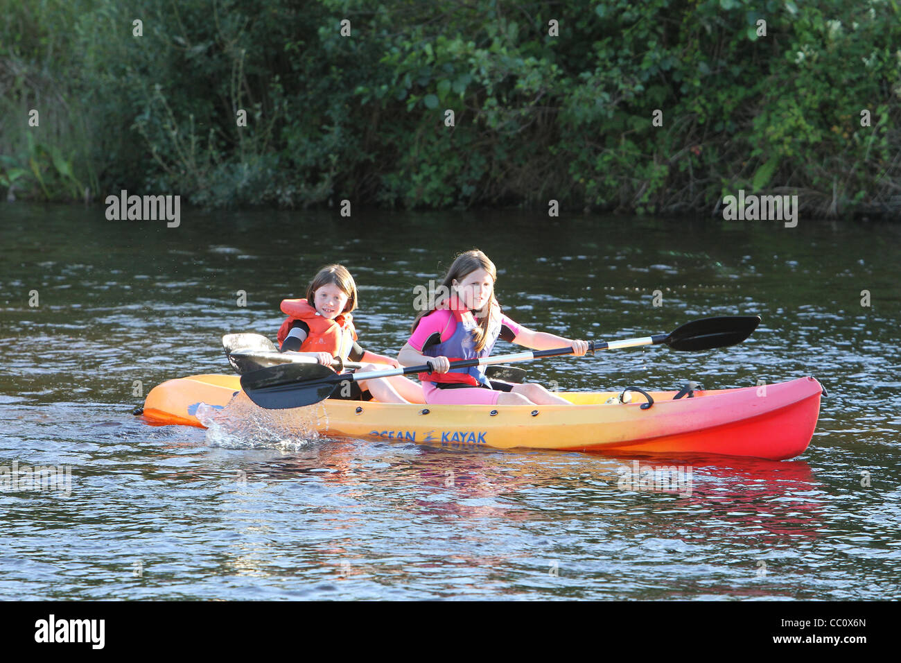 Two children canoeing . Co. Leitrim. Ireland Stock Photo - Alamy