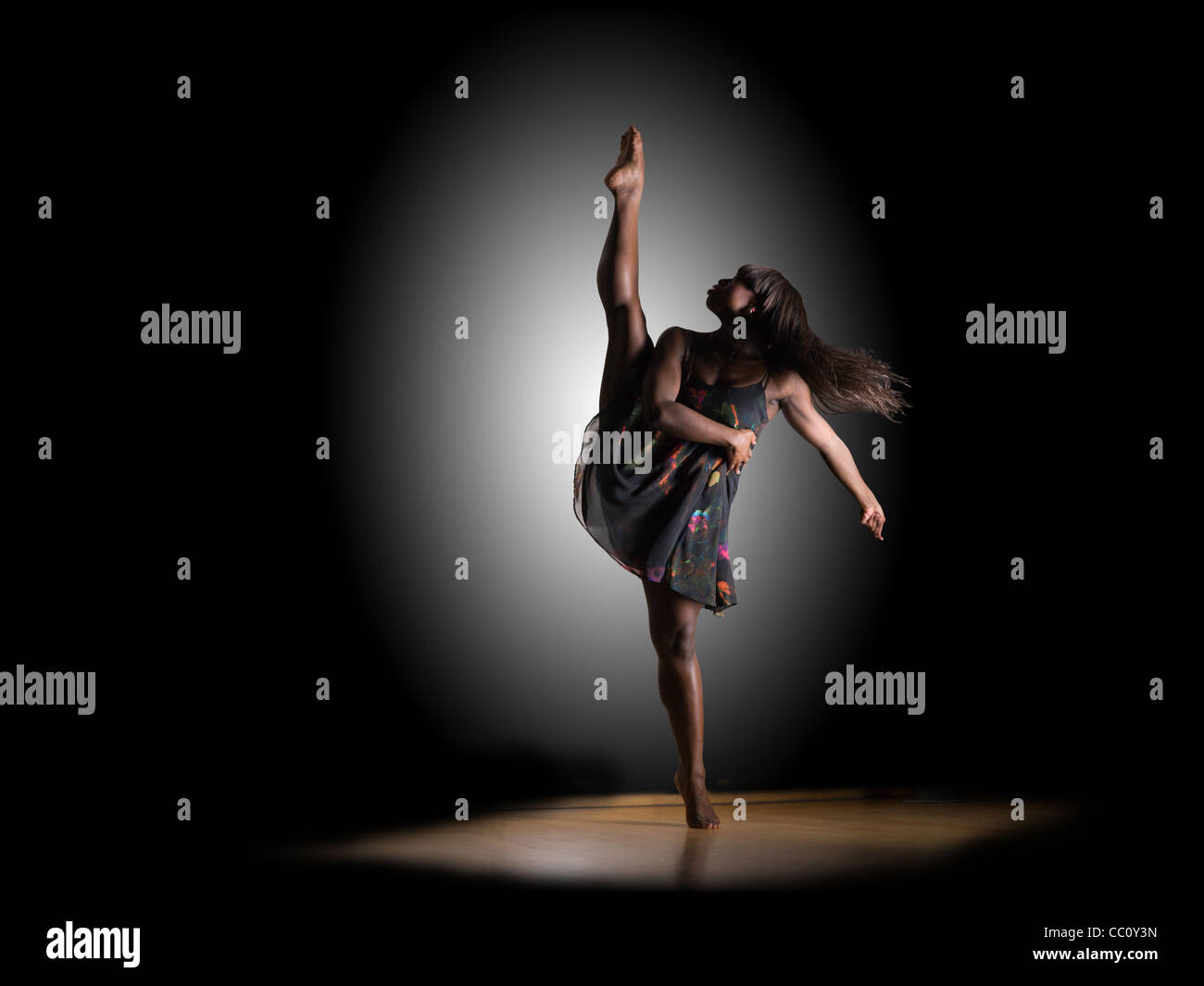 dancer with leg pointing upward (James Cousins Dance Group Stock Photo ...