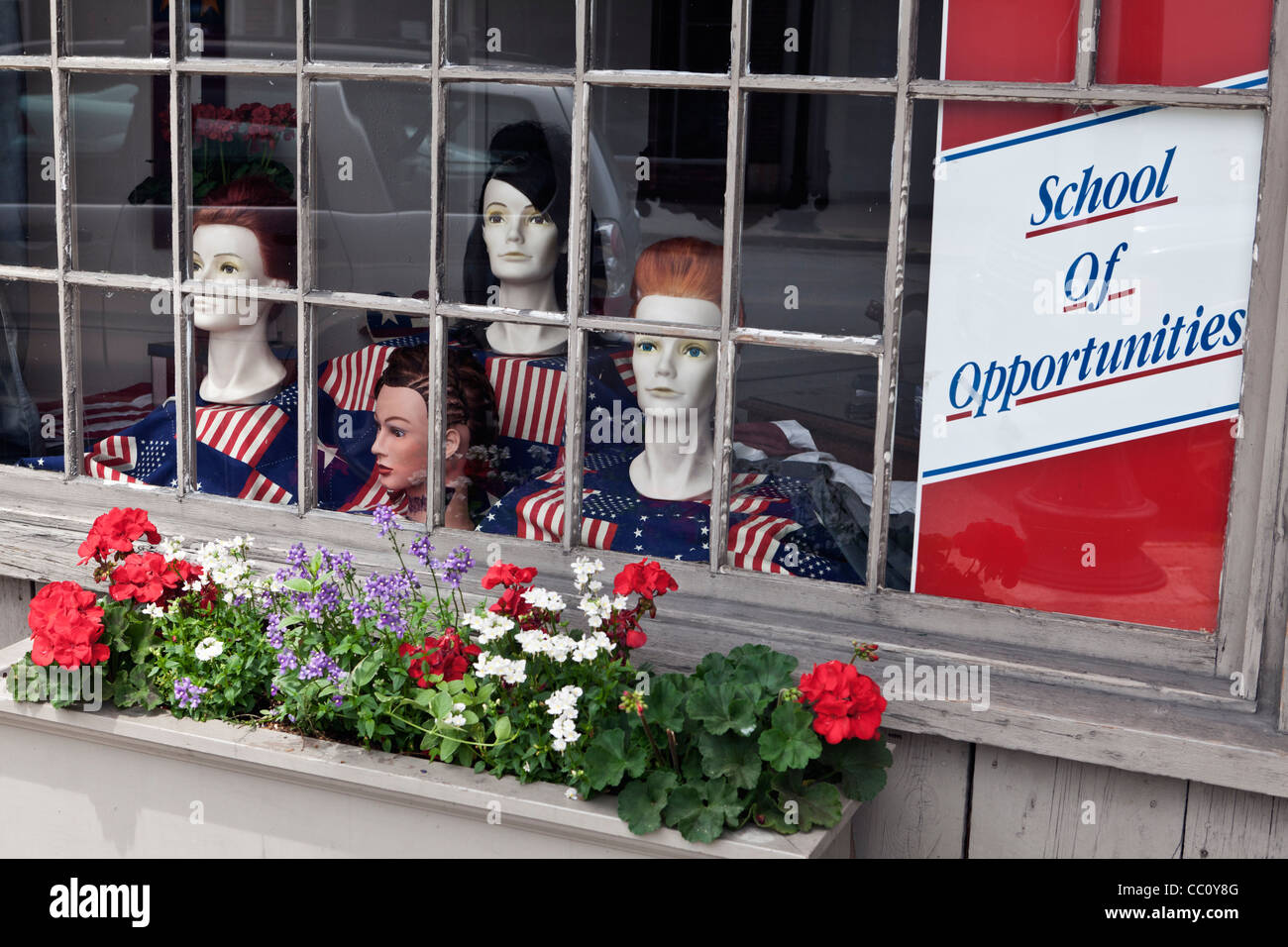 Dummies in window with School of Opportunities sign New Bedford ...