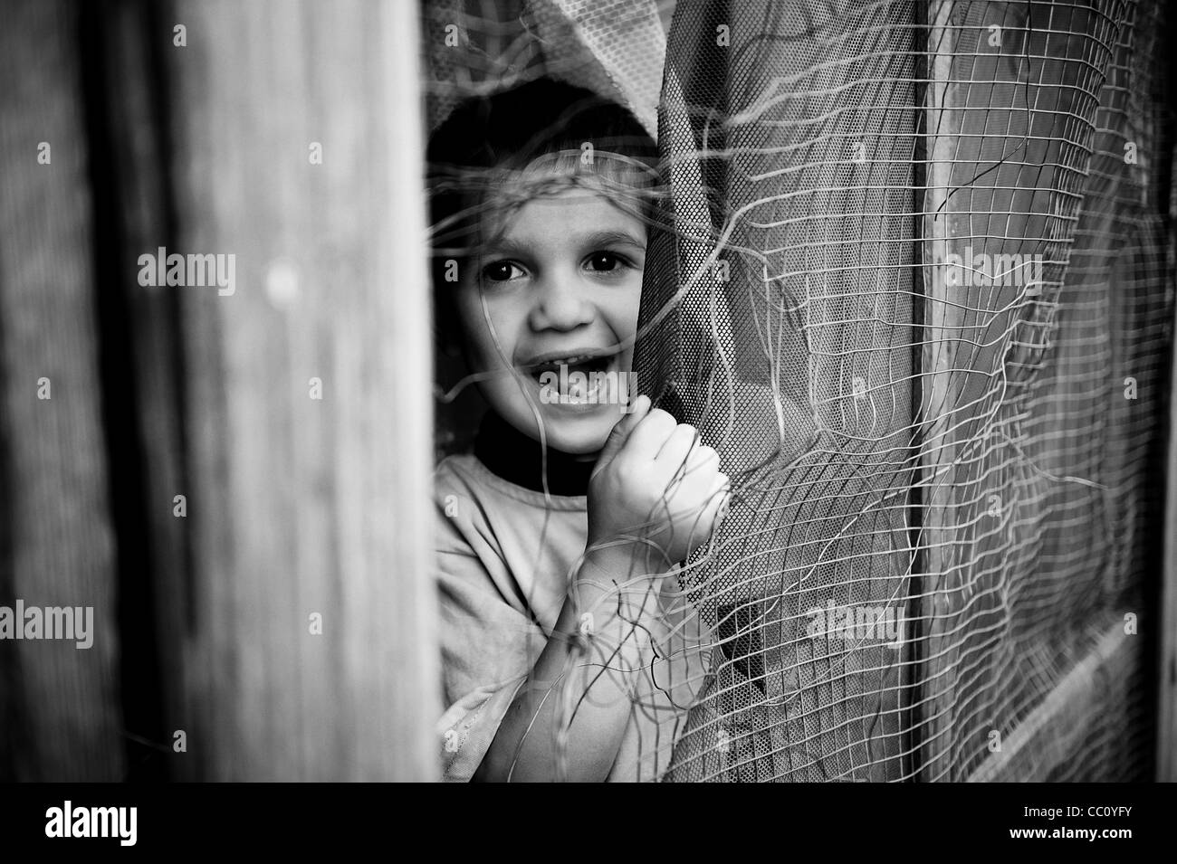 A child looking outside Stock Photo - Alamy