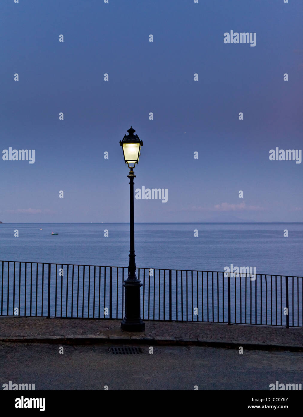 Light post and Mediterranean Sea, Naples, Italy Stock Photo - Alamy