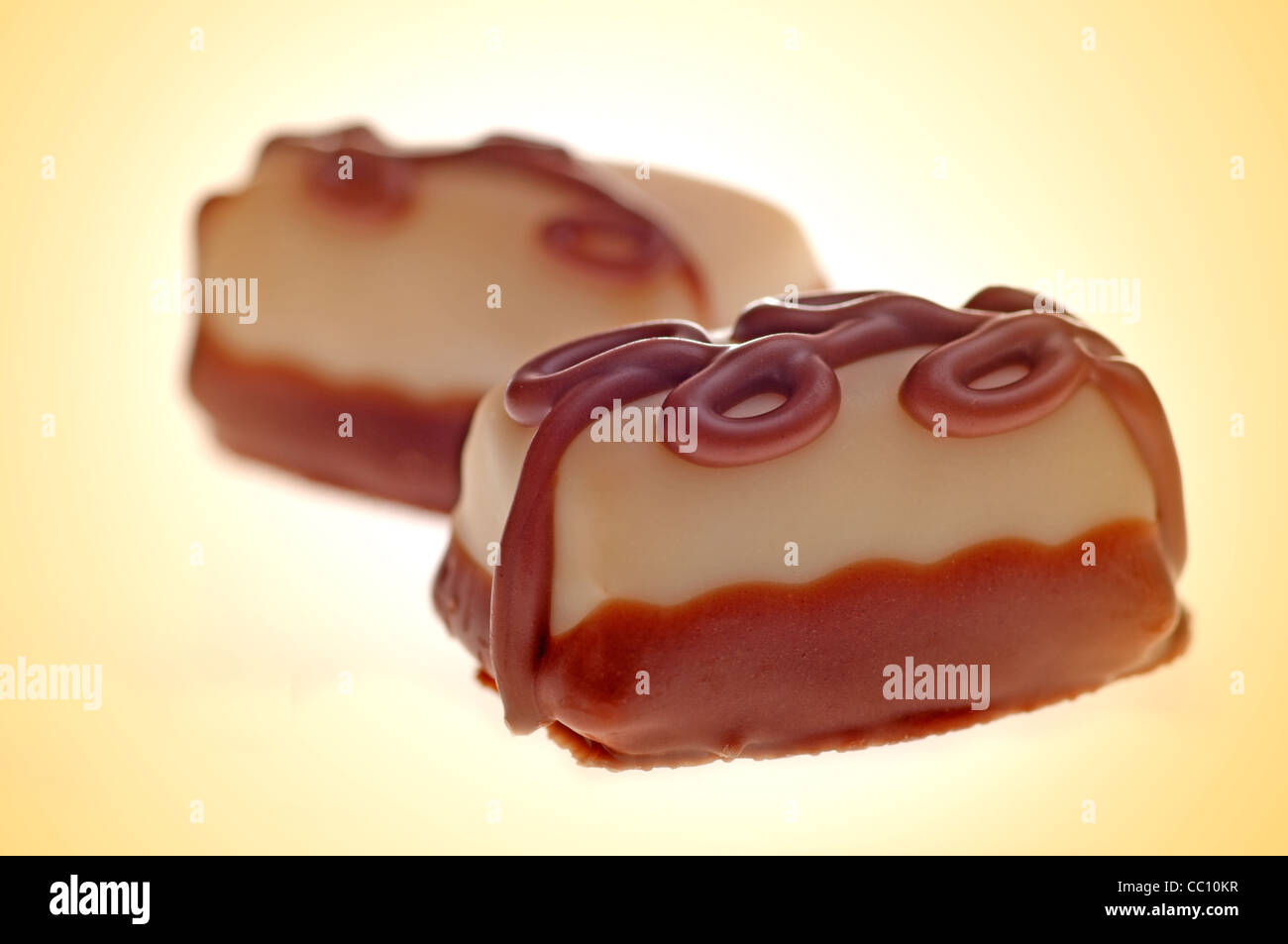 Two chocolate pralines Stock Photo - Alamy